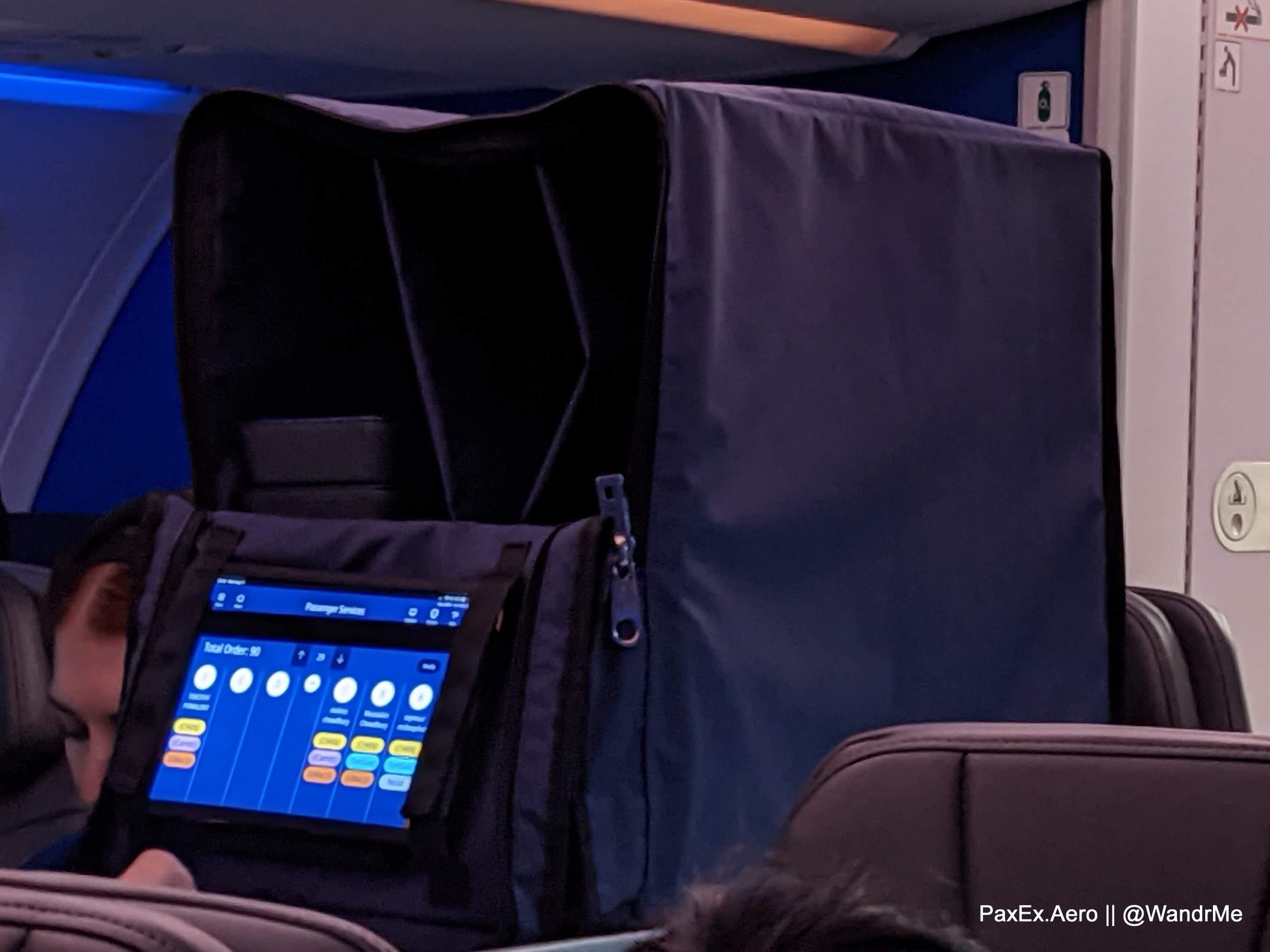 A color-coded display for crew helps speed the meal delivery in coach ...